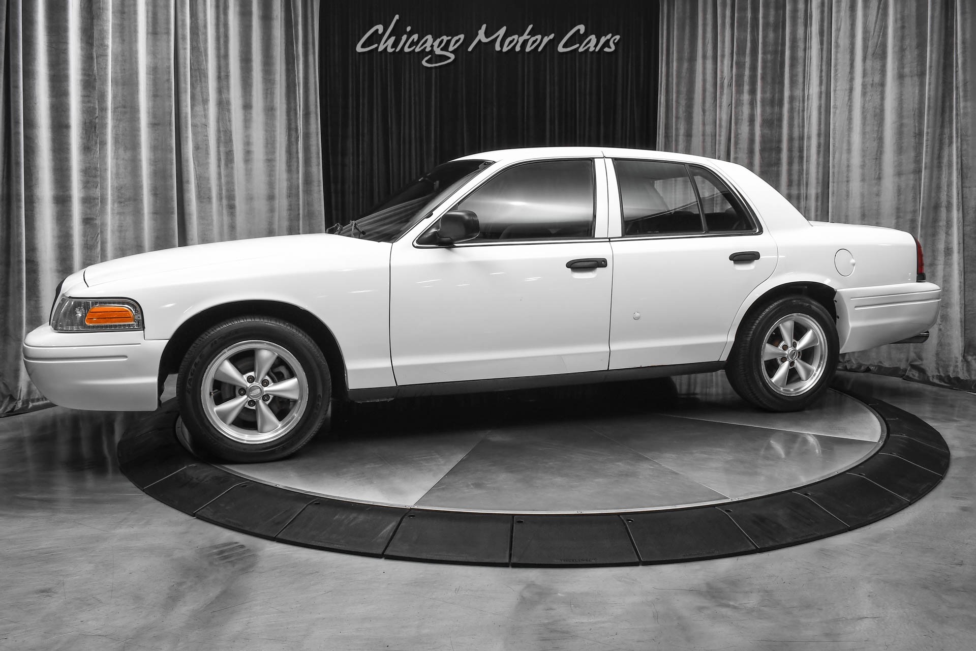 White Ford Crown Victoria